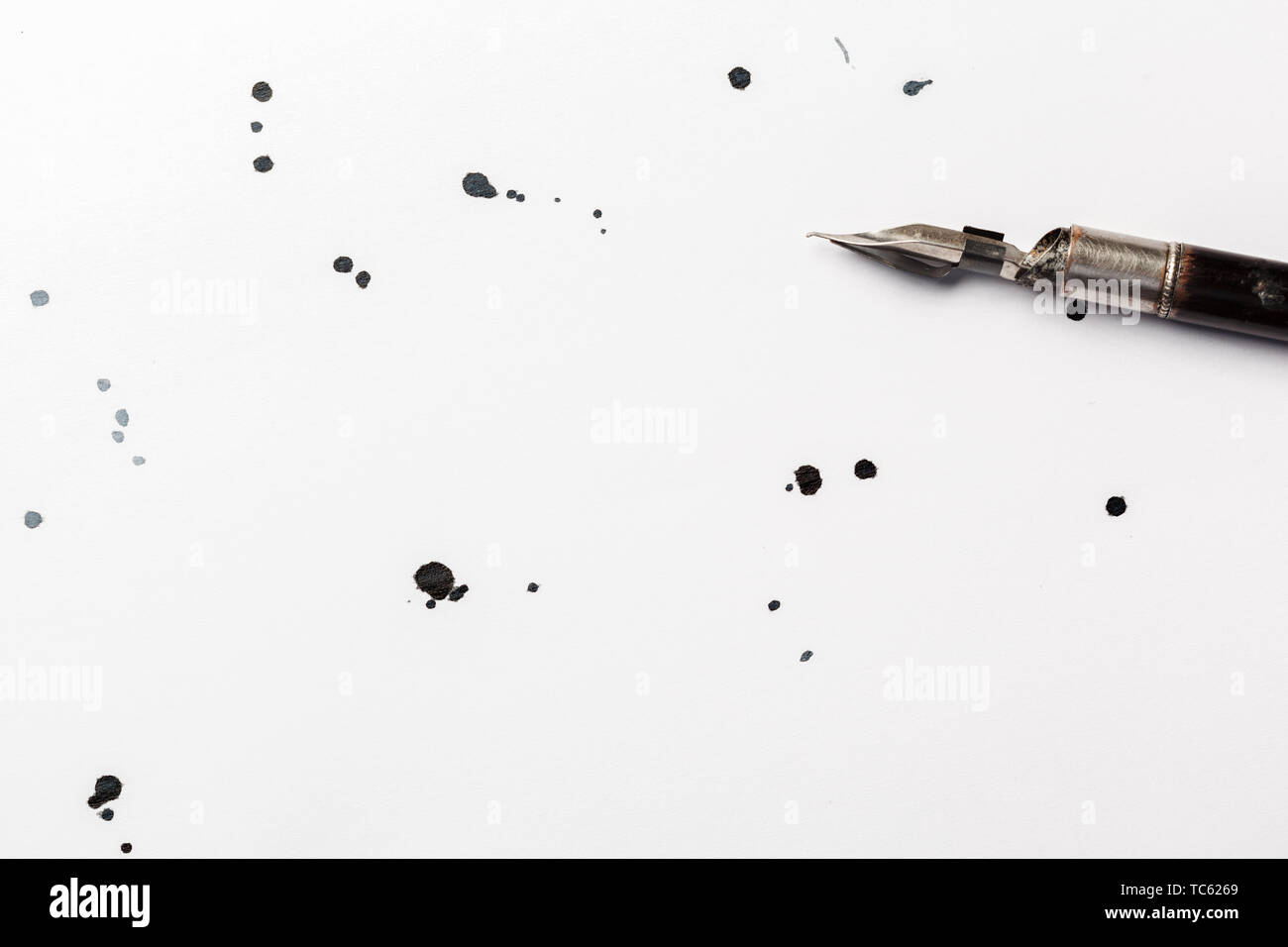Black ink spatter on white paper hi-res stock photography and images ...