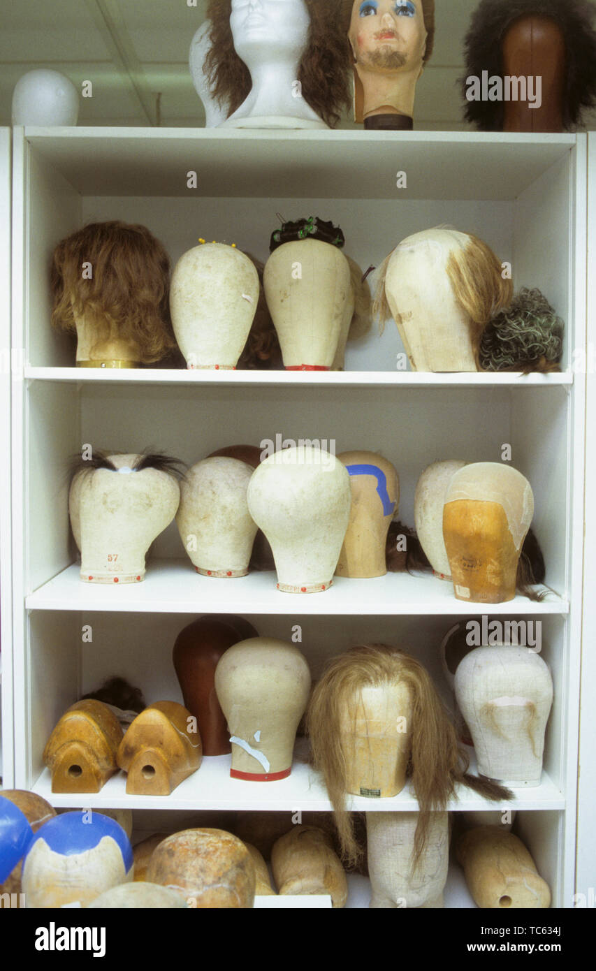 WIG MAKER workshop with wigs in different stages Stock Photo - Alamy