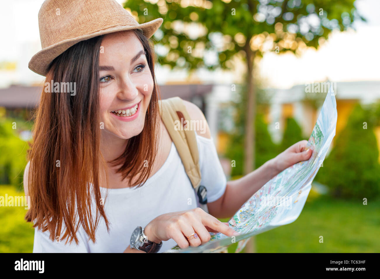 travel guide, tourism in Europe, woman tourist with map on the street ...