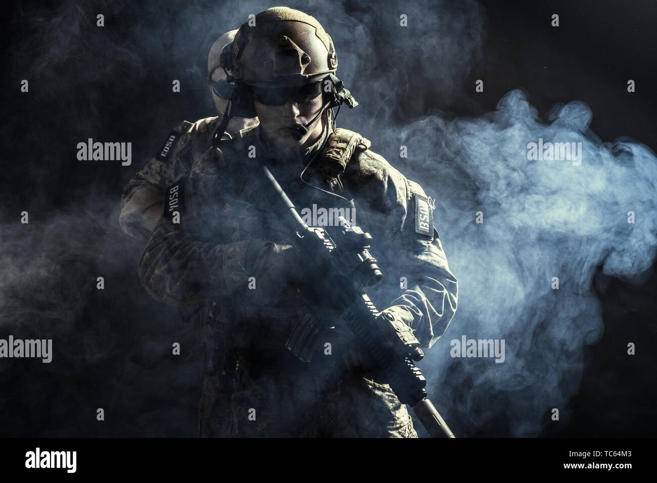 Group of security forces in Combat Uniforms with rifles Stock Photo - Alamy