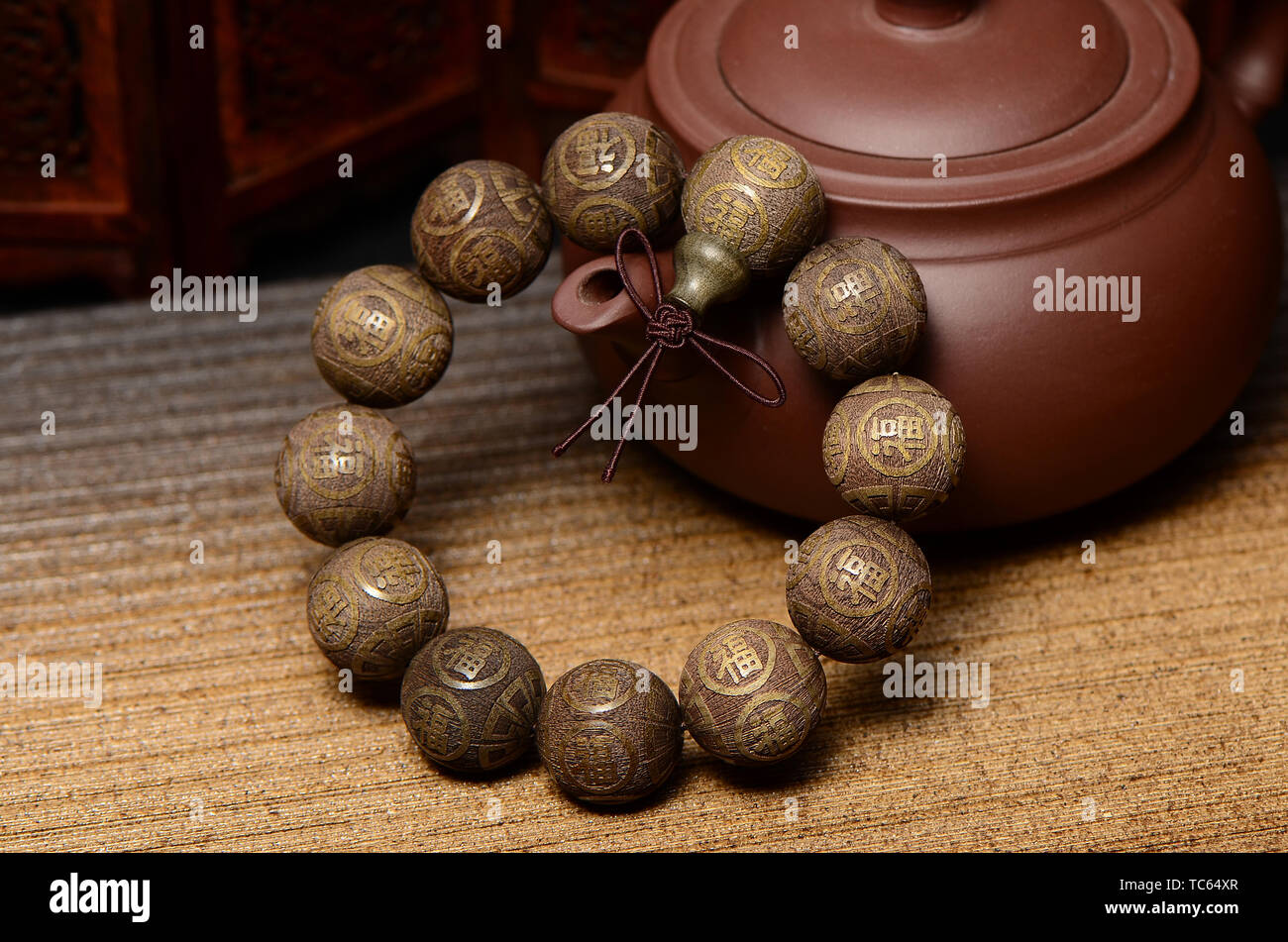 Golden silk Namu Yin sunken wood hand string Buddha beads Stock Photo ...
