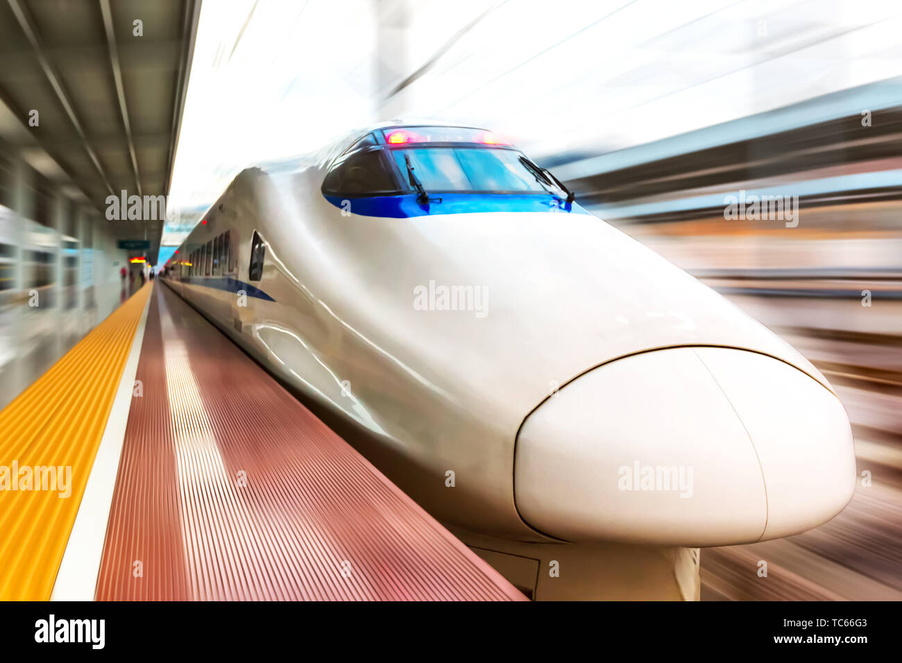 Harmony high-speed rail EMU train enters station Stock Photo - Alamy