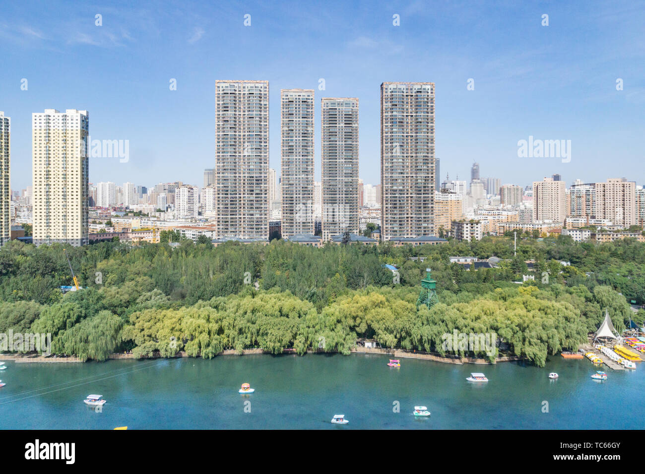 Autumn overlooking urban buildings, woods and rivers in Shenyang, China ...