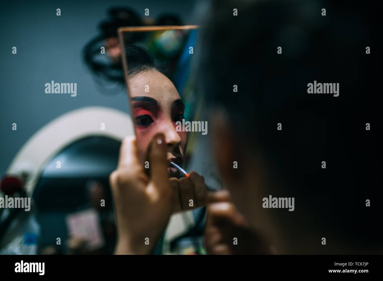 A theatrical performer in makeup backstage Stock Photo - Alamy