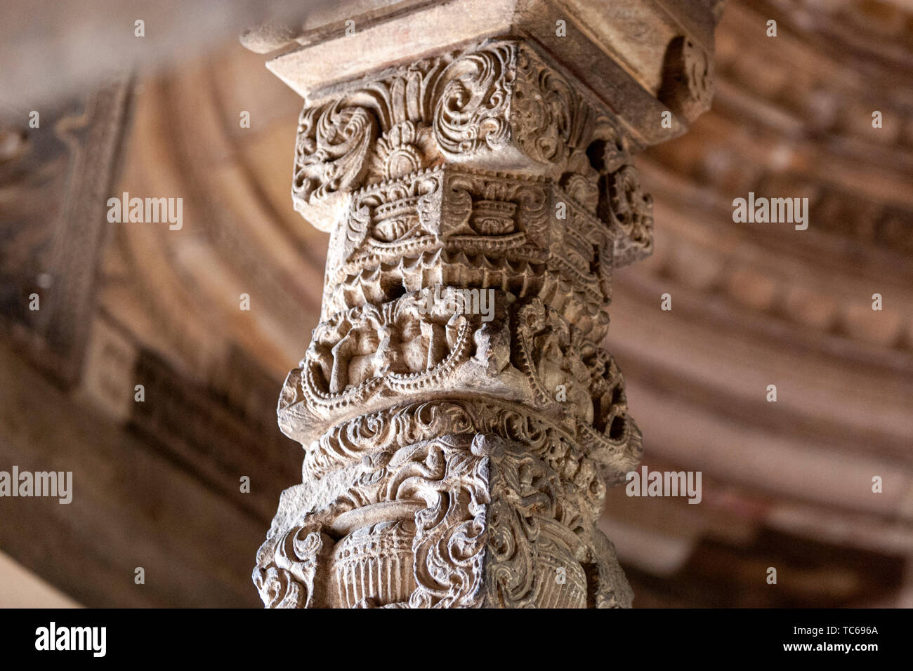 Intricate stone carvings on the cloister columns at Quwwat ul-Islam ...