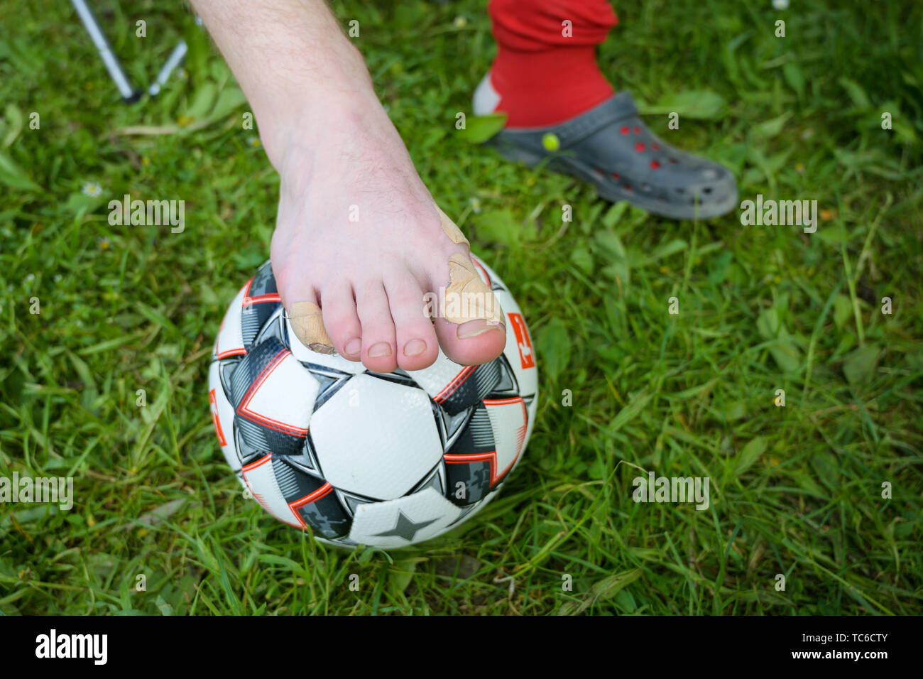 Soccer football player standing feet hi-res stock photography and ...