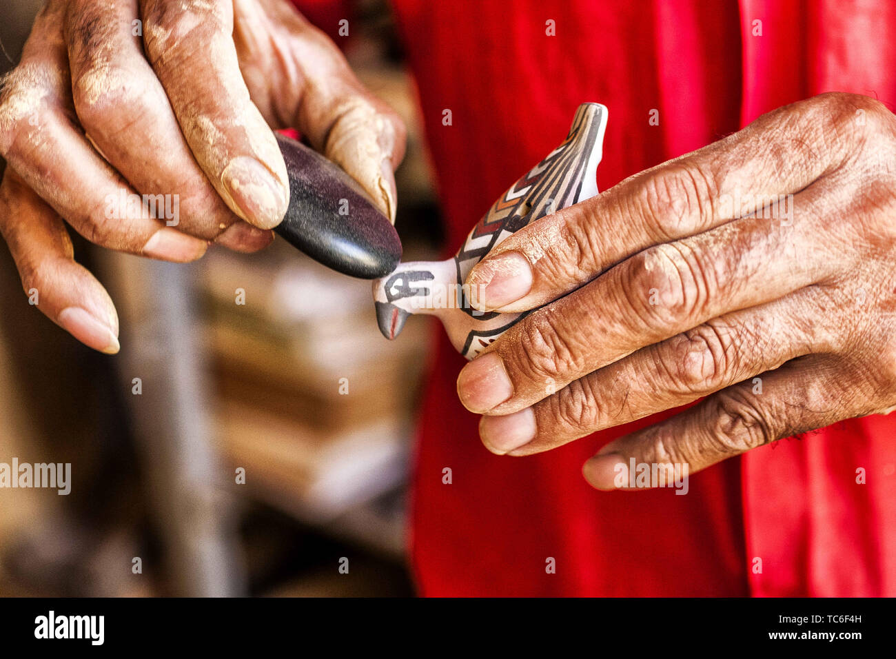 Nasca, Ica, Peru. 20th May, 2011. A close view of a Peruvian artisan ...