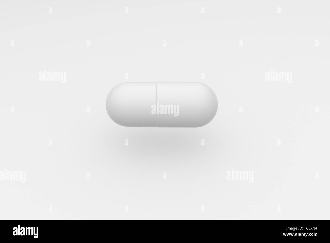 Single white pill on white background. Antibiotic in the capsule. 3d ...