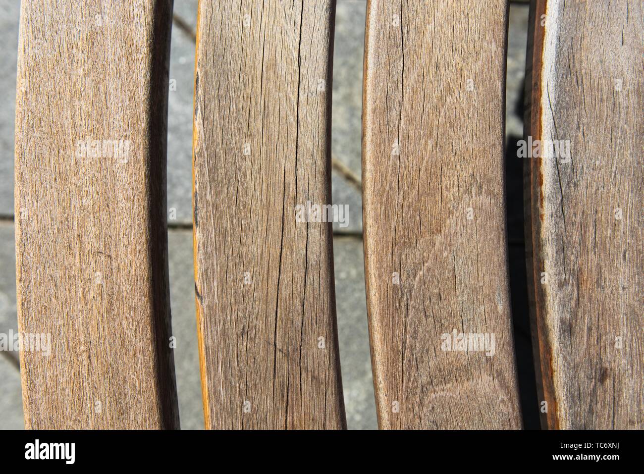 Wooden modern trendy design round circular park bench Stock Photo - Alamy