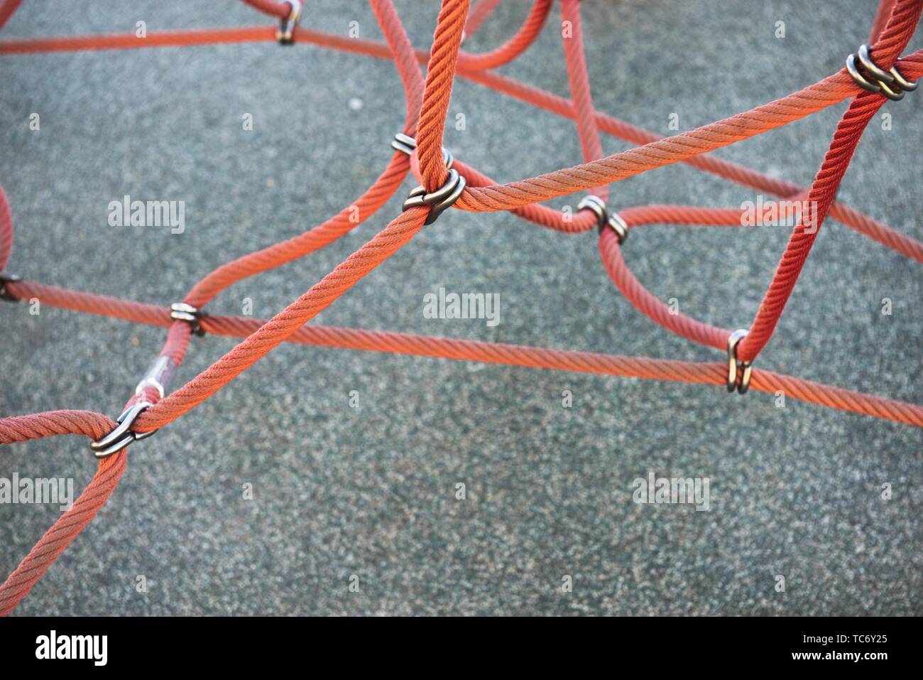 Red ship ropes connected by reef knot Stock Photo - Alamy