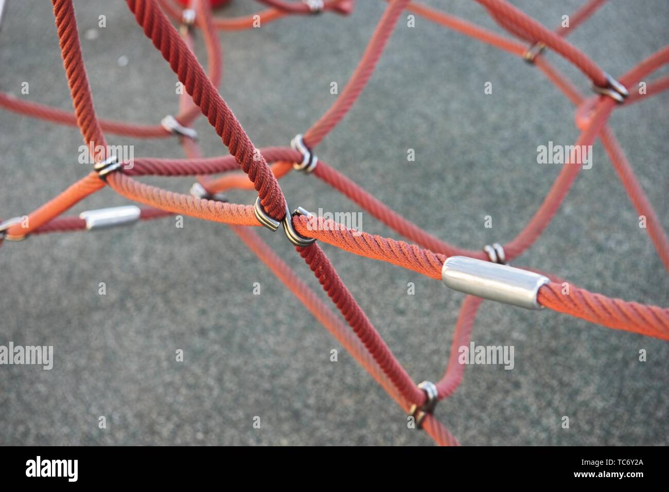 Red ship ropes connected by reef knot Stock Photo - Alamy