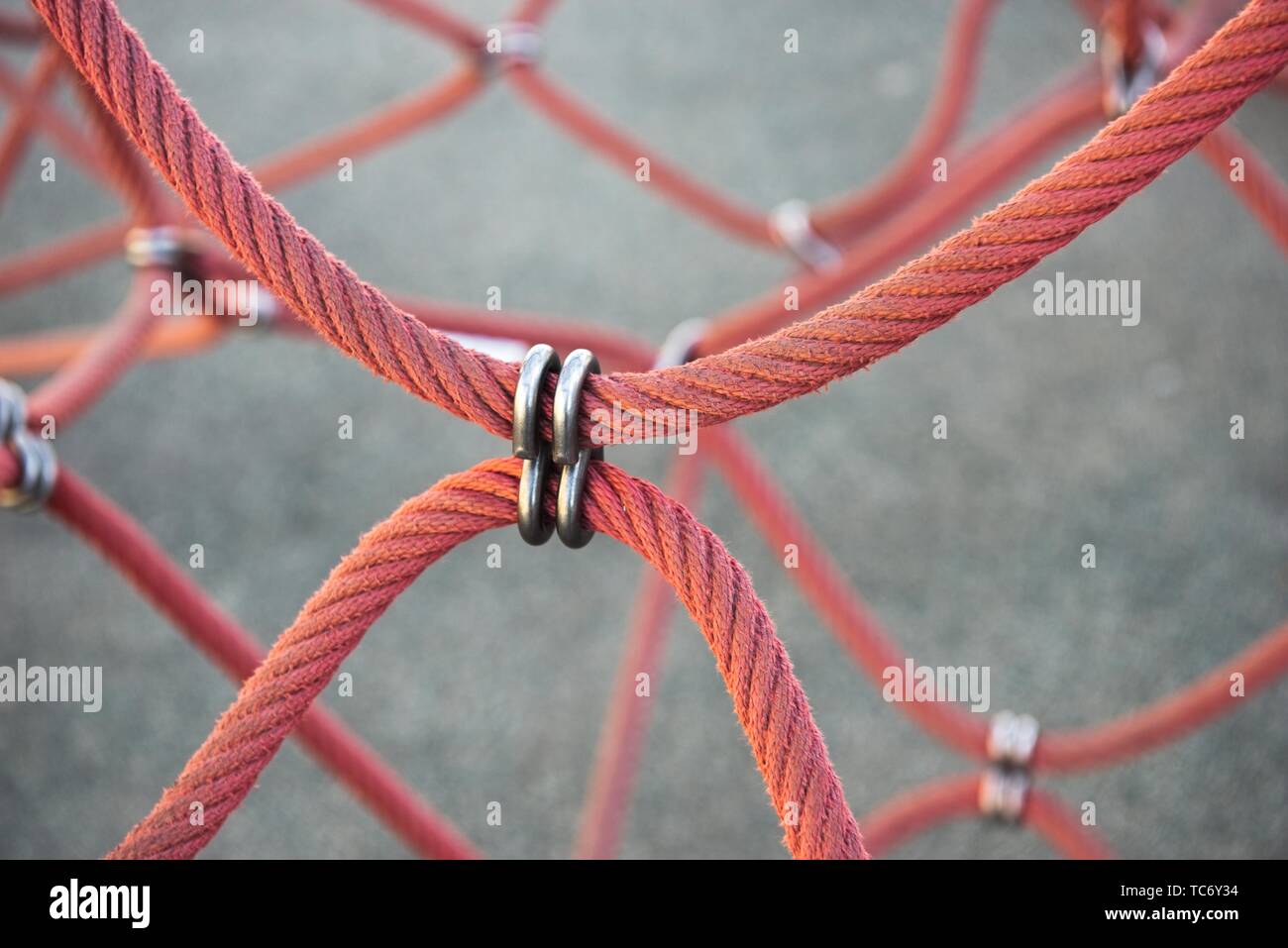 Red ship ropes connected by reef knot Stock Photo - Alamy
