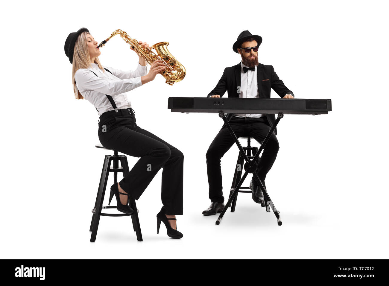 Female keyboard player performing High Resolution Stock Photography and ...