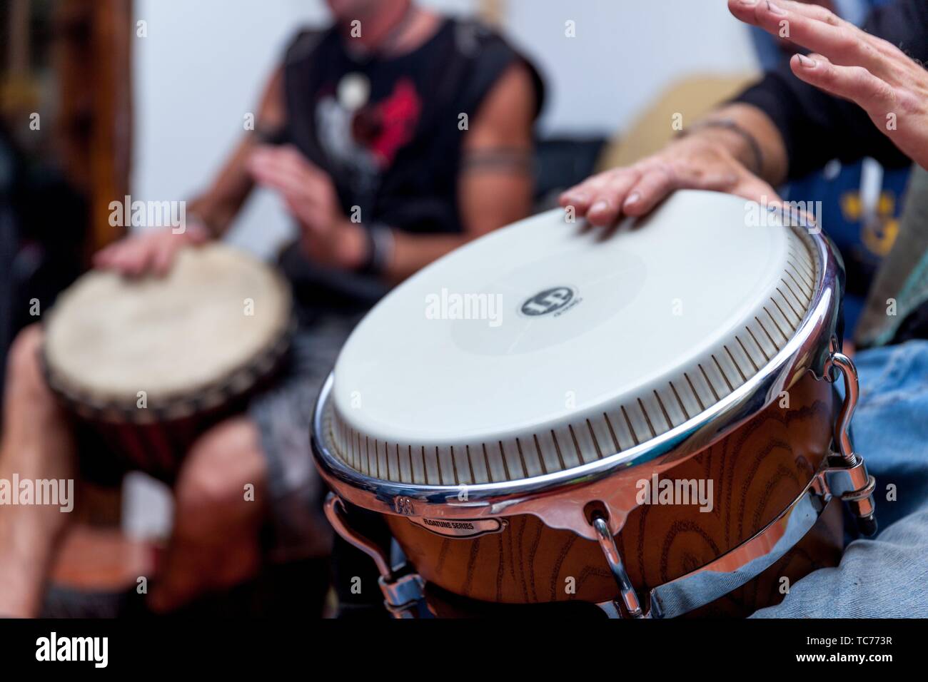 Playing bongos hi-res stock photography and images - Alamy