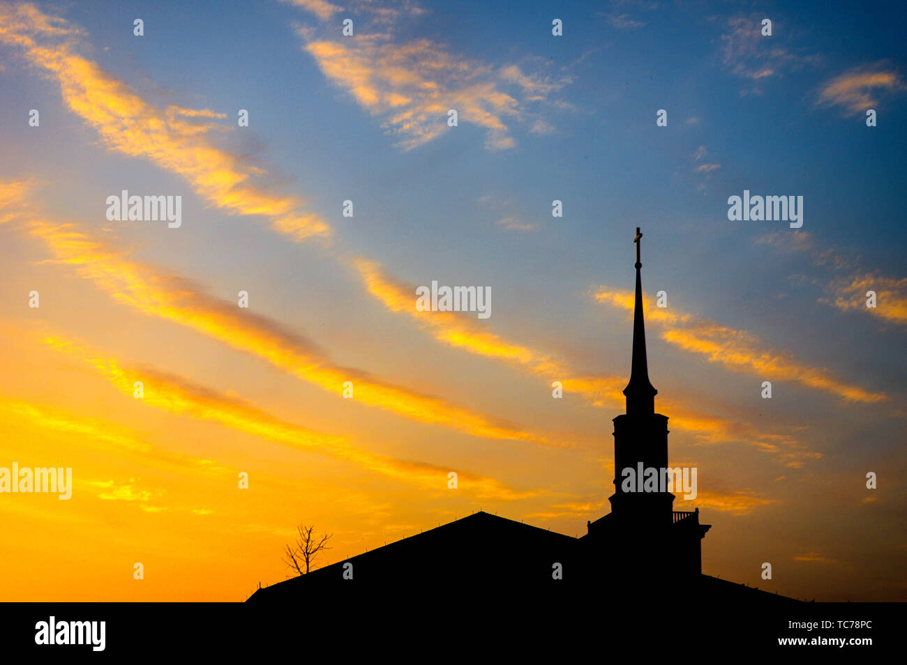 Church in the sunset Stock Photo - Alamy