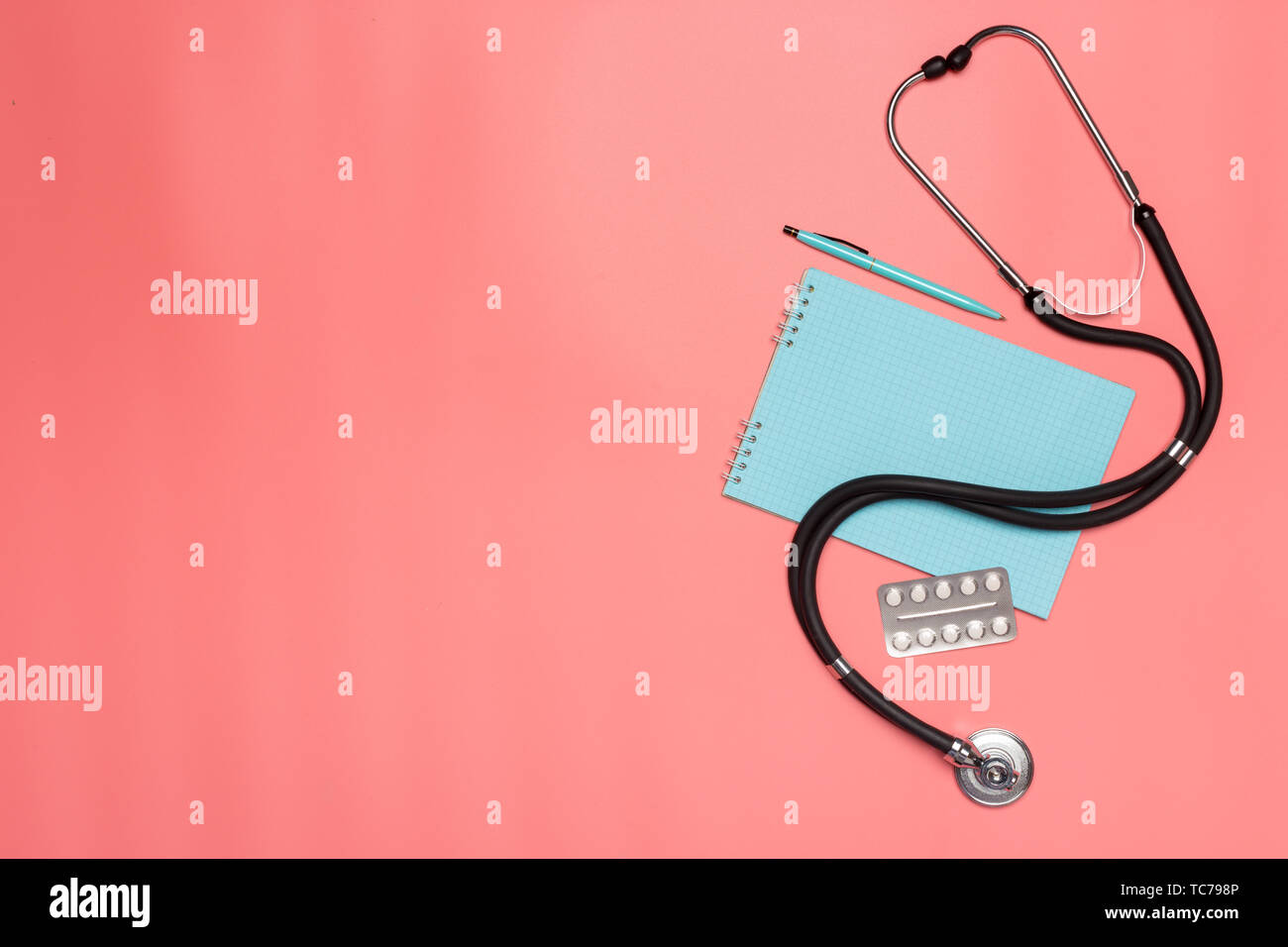 Medical equipment on a pink pastel background Stock Photo - Alamy