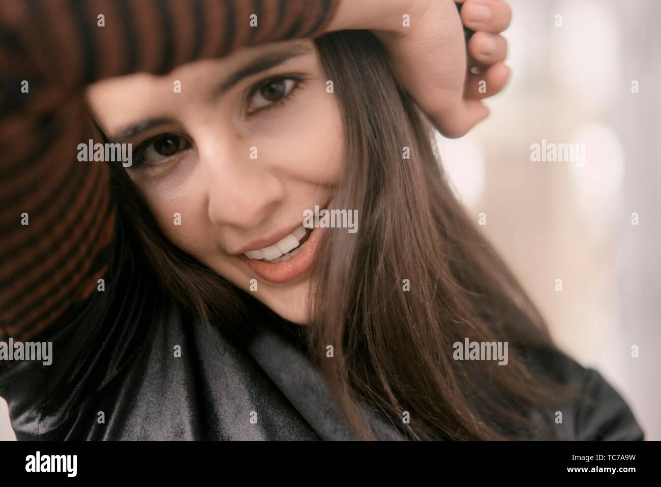 Coy smile hi-res stock photography and images - Alamy