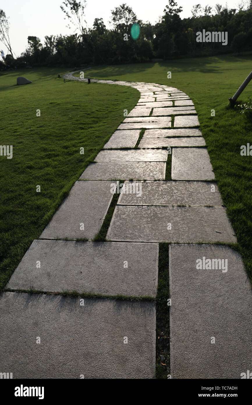 Pavement, cement road, park, path Stock Photo - Alamy