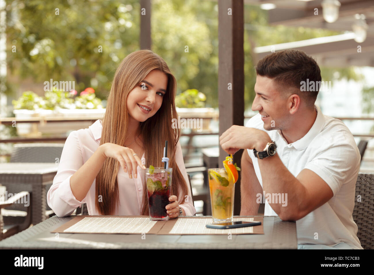 Two people in cafe enjoying the time spending with each other Stock ...