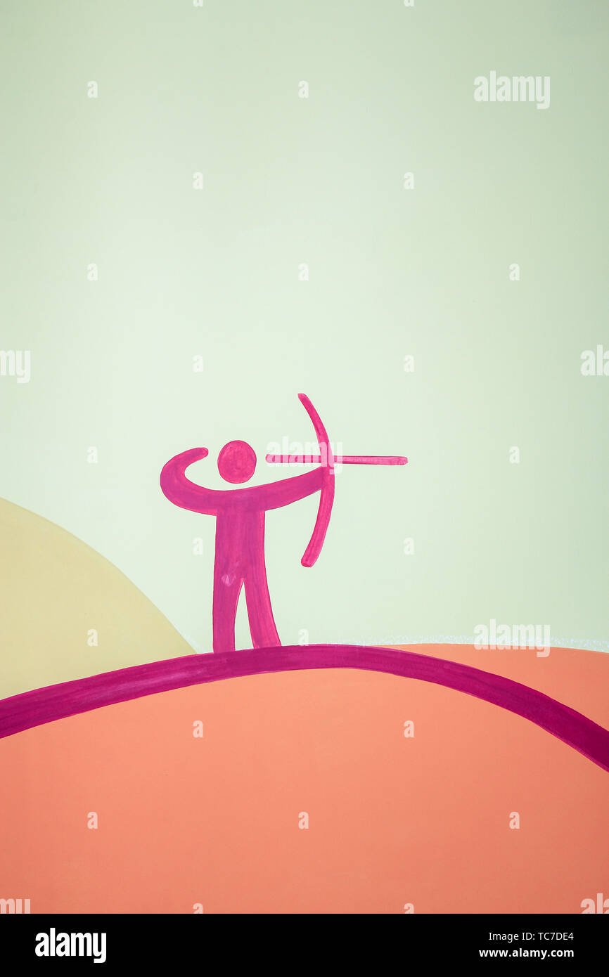 A pink archer painted on a wall Stock Photo - Alamy