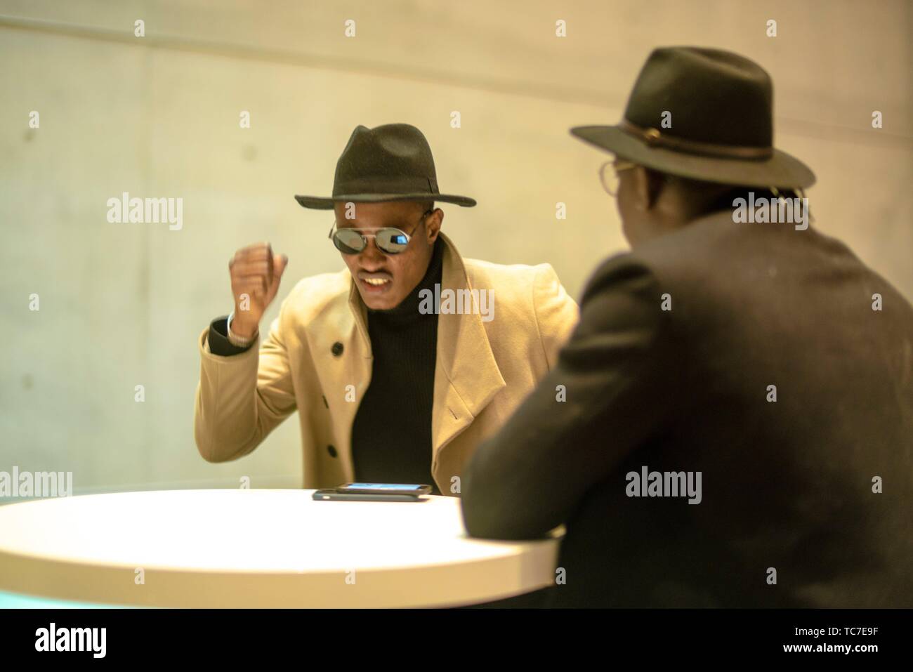 Man hitting table hand hi-res stock photography and images - Alamy