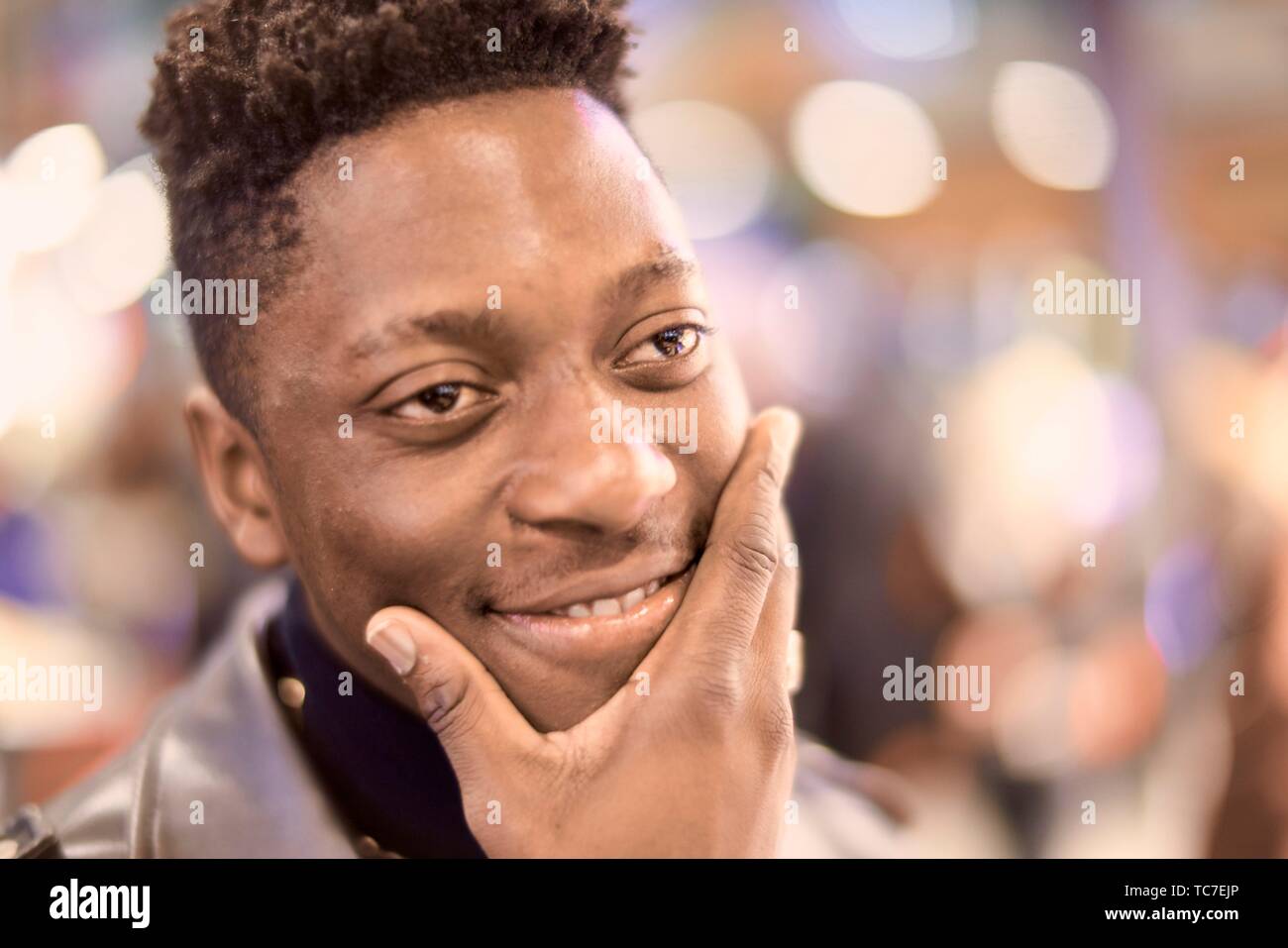 African man smirking hi-res stock photography and images - Alamy