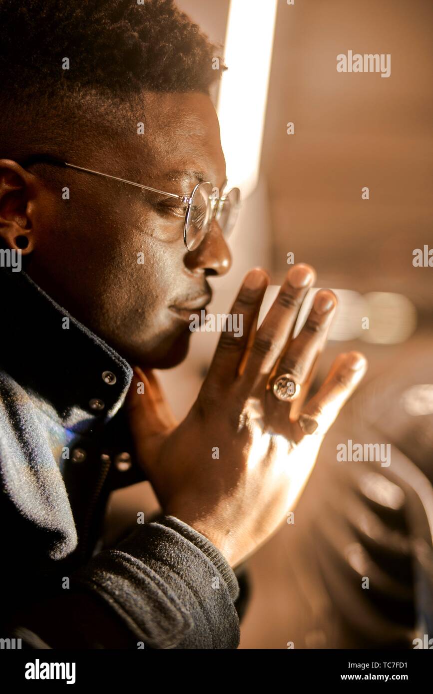 Sideview profile wearing hi-res stock photography and images - Alamy