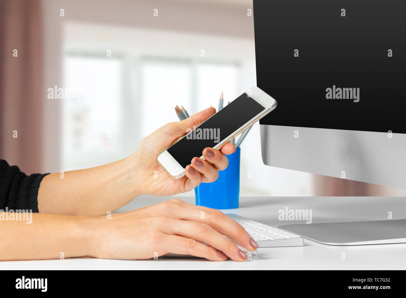 computer display in office interior Stock Photo - Alamy