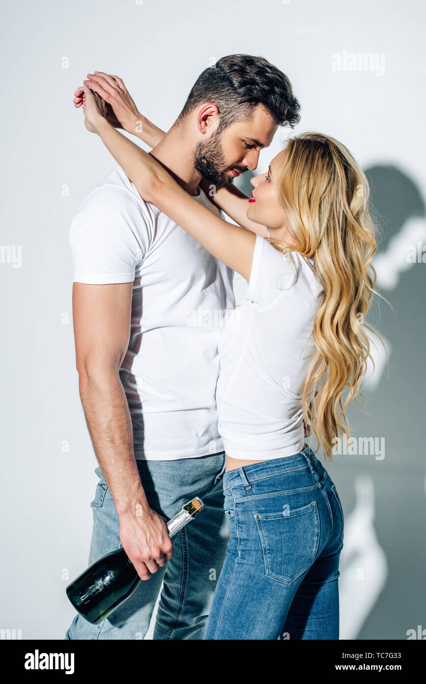 Blonde Woman Hugging Man