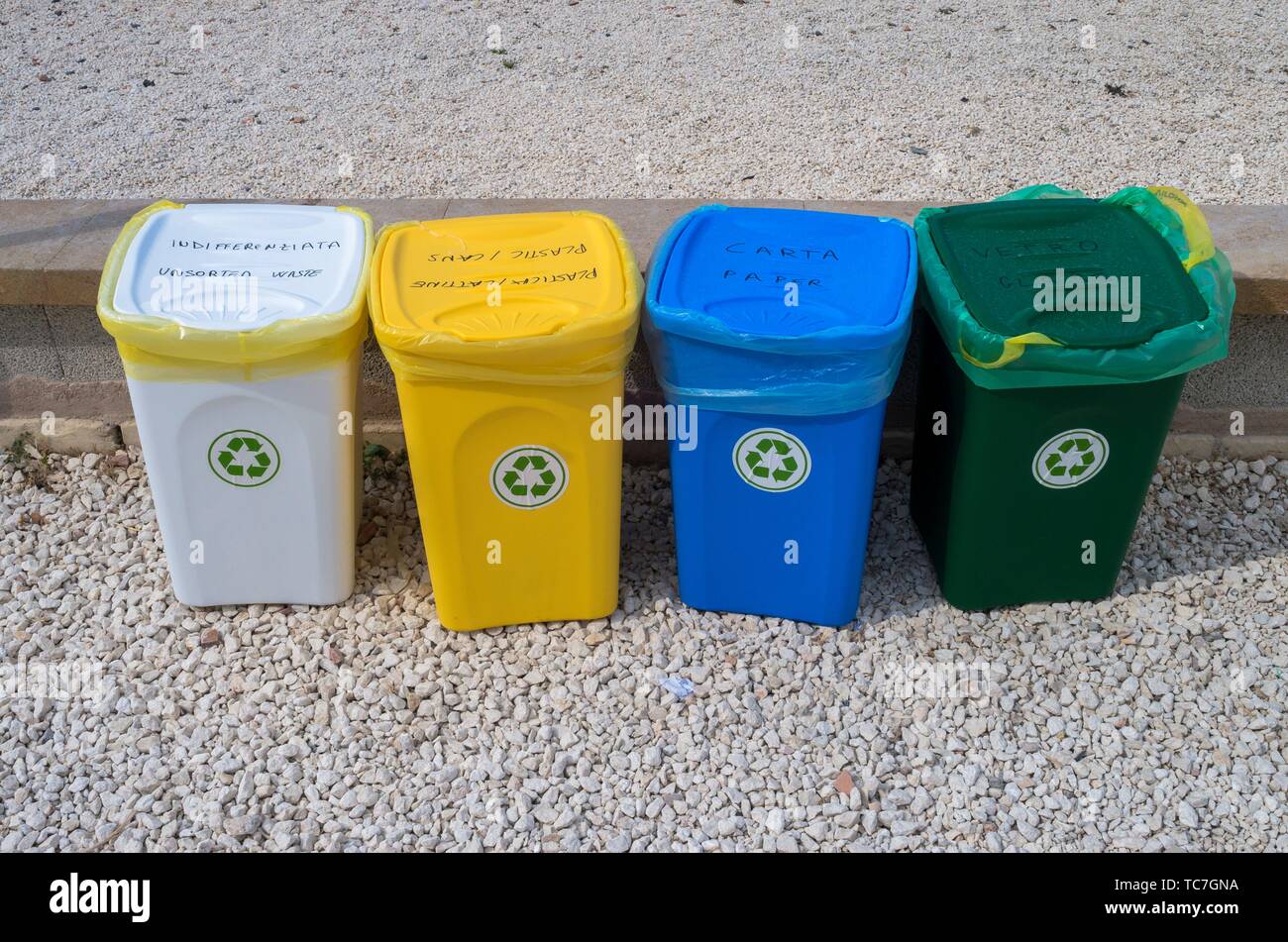 Recycling containers glass paper plastic hi-res stock photography and ...
