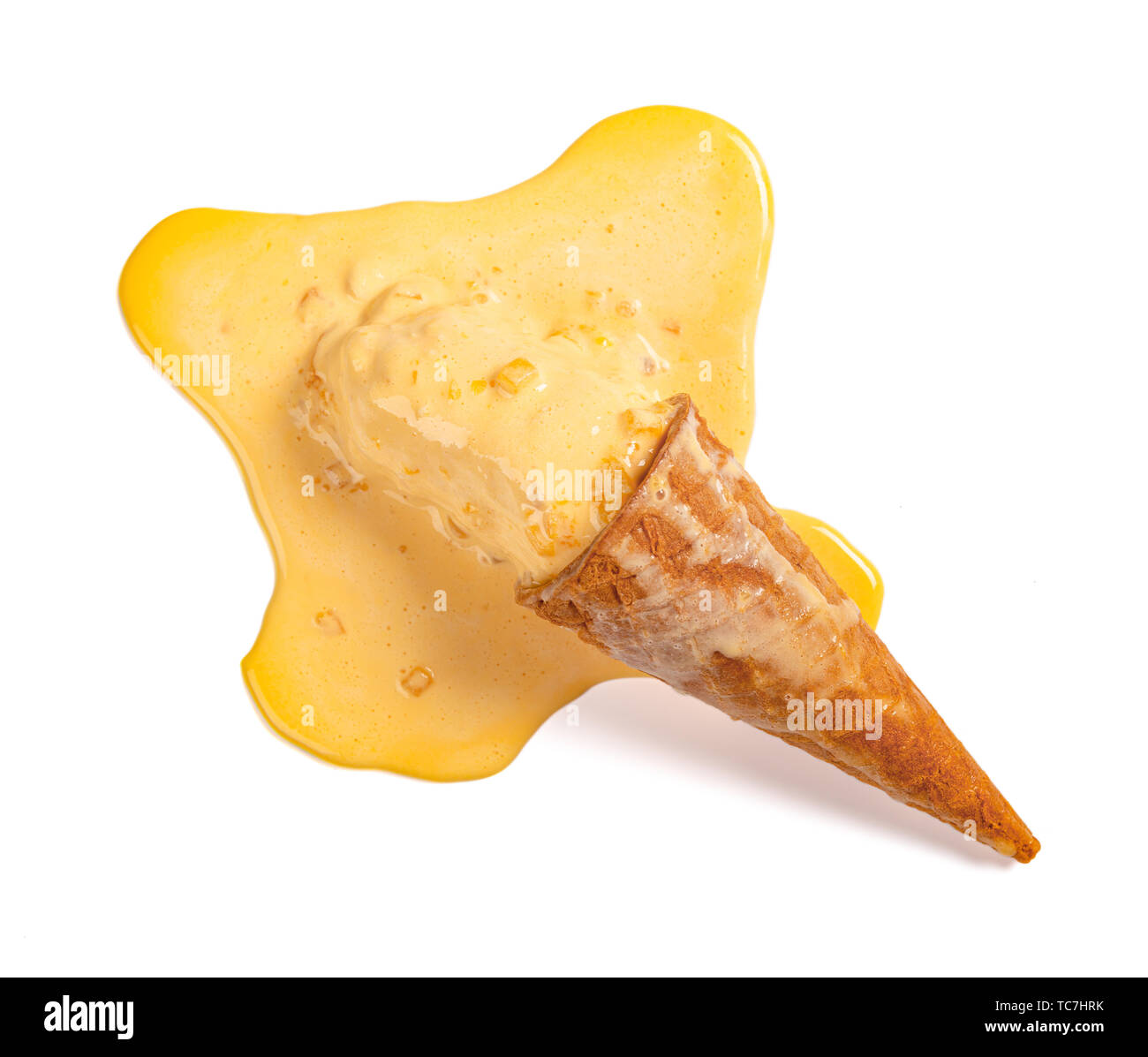 top view mango flavor ice cream cone in a melting process on white with ...