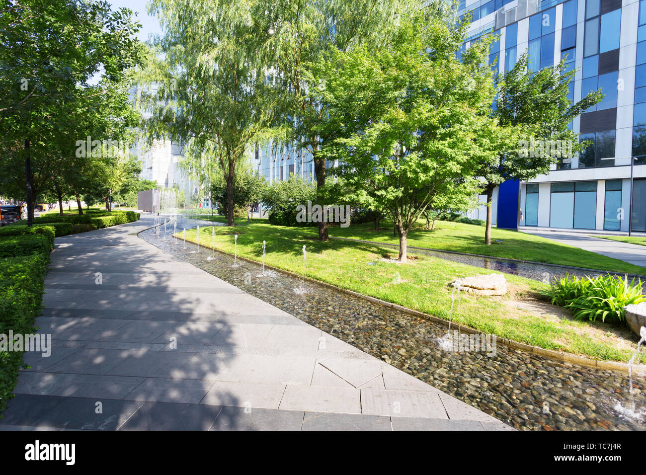 footpath around modern office building Stock Photo - Alamy