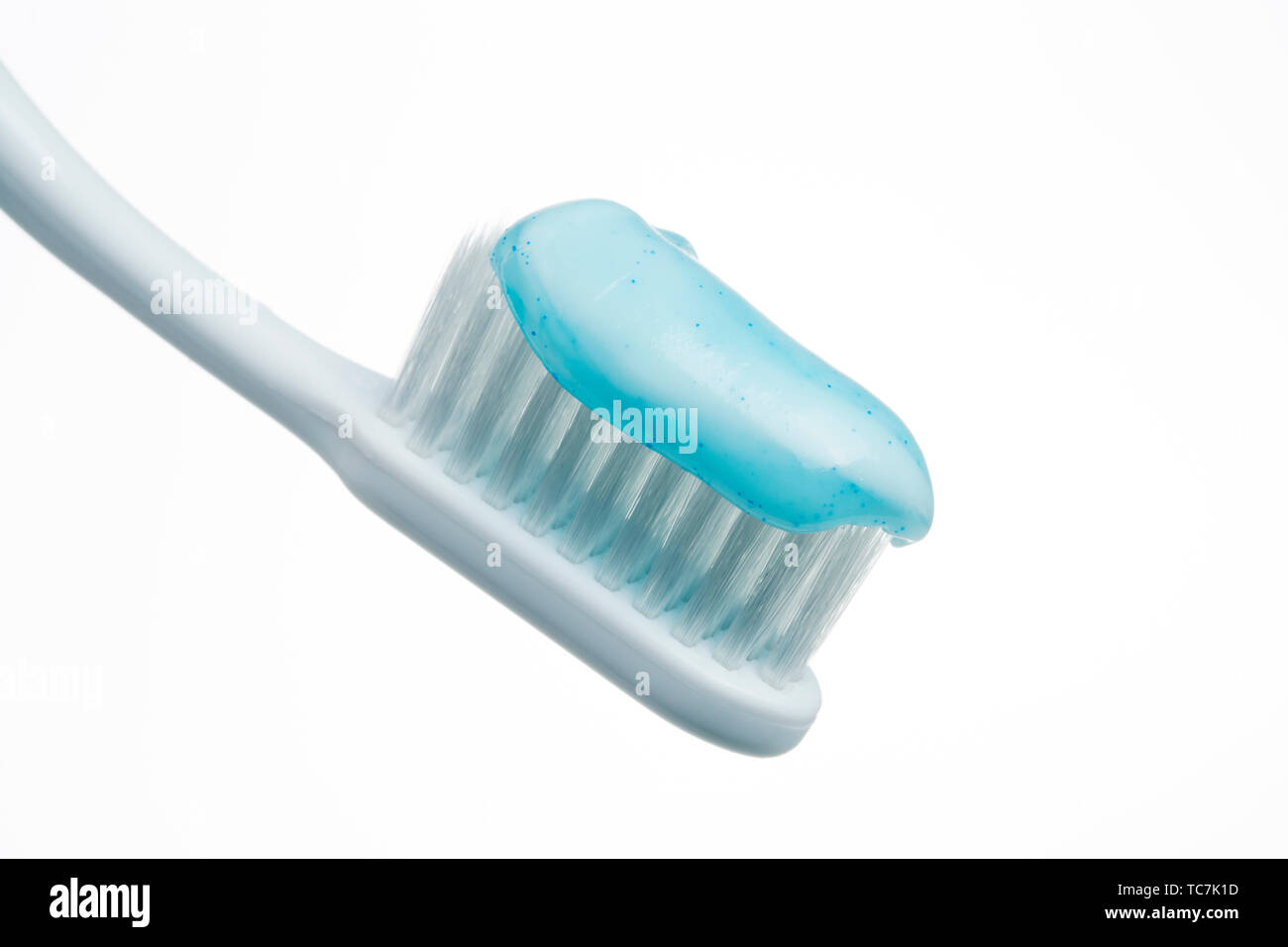 Toothbrush blue bristles toothpaste hi-res stock photography and images ...