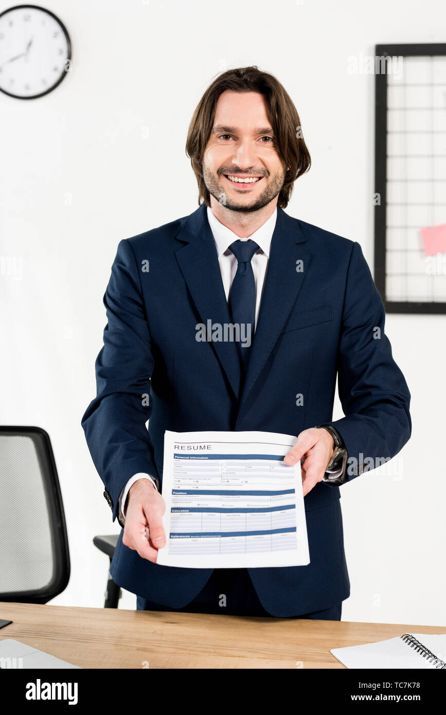 Hands holding cv resume hi-res stock photography and images - Alamy