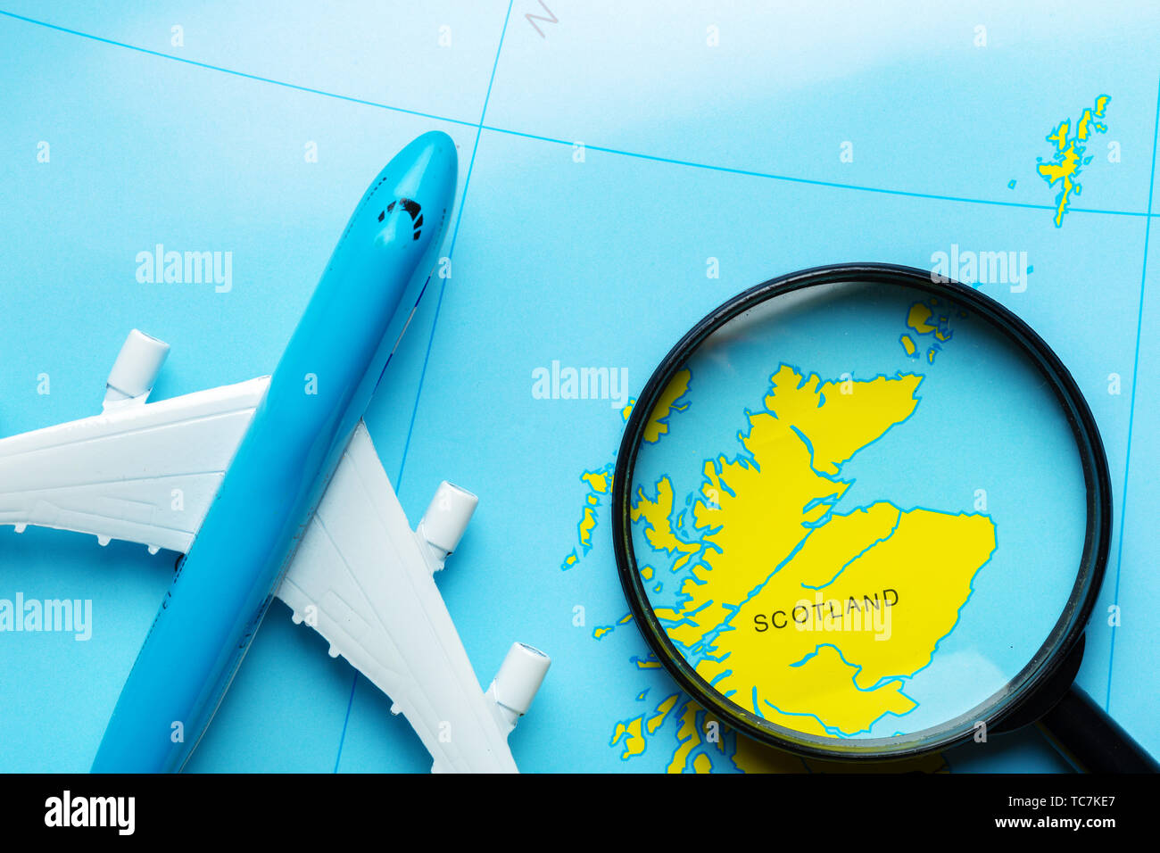 Magnifying glass and map Stock Photo - Alamy