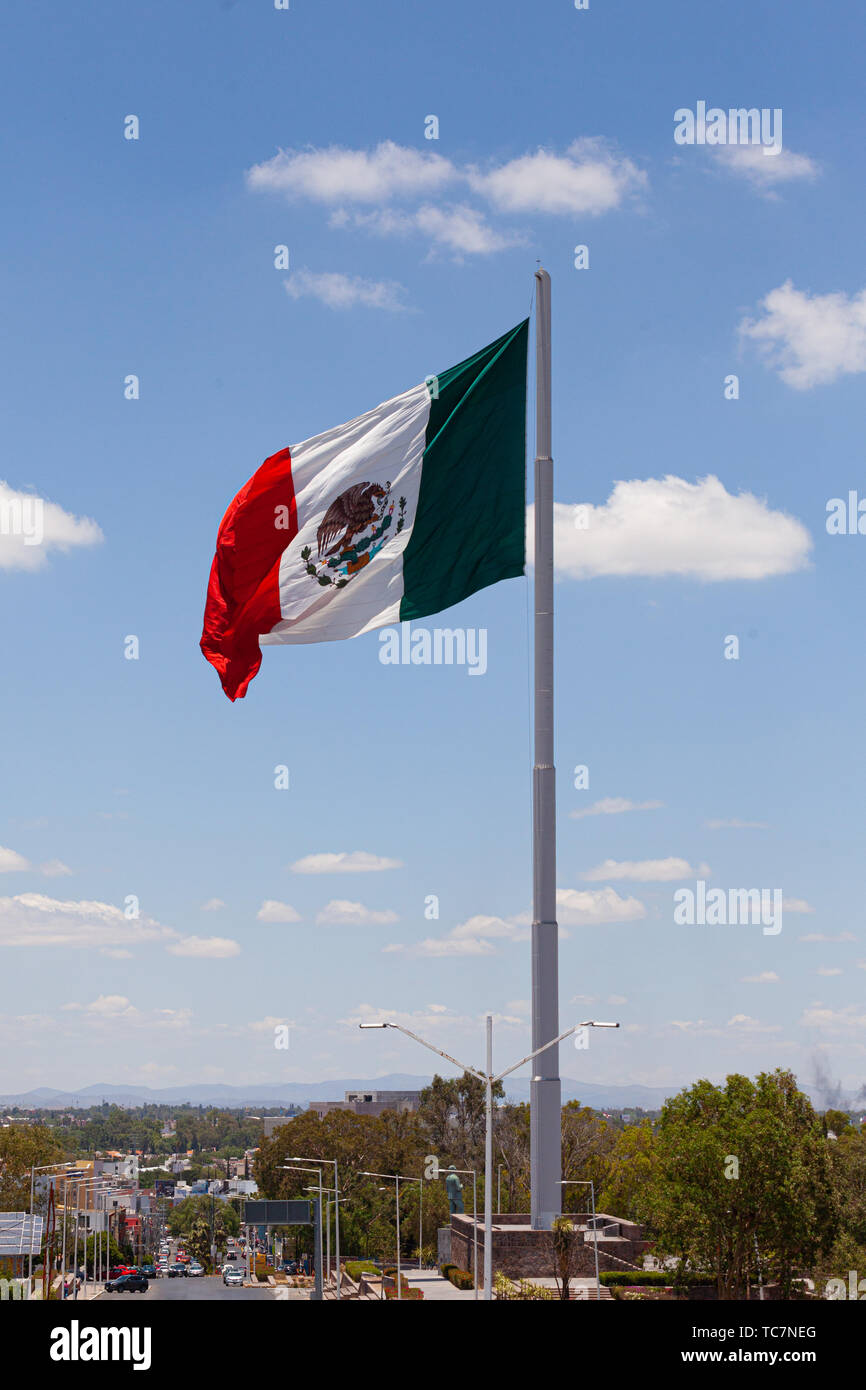 Mexican Flag waving in the wind Stock Photo - Alamy