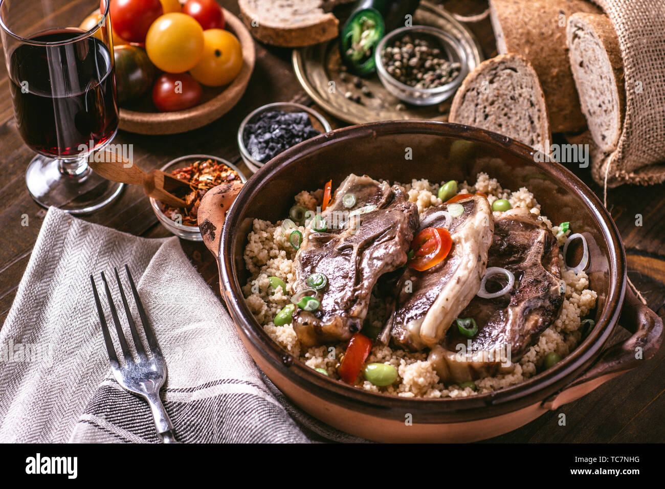 Roasted Lamb Loin Chops with Soybean and Couscous in Rustic Dish Stock ...