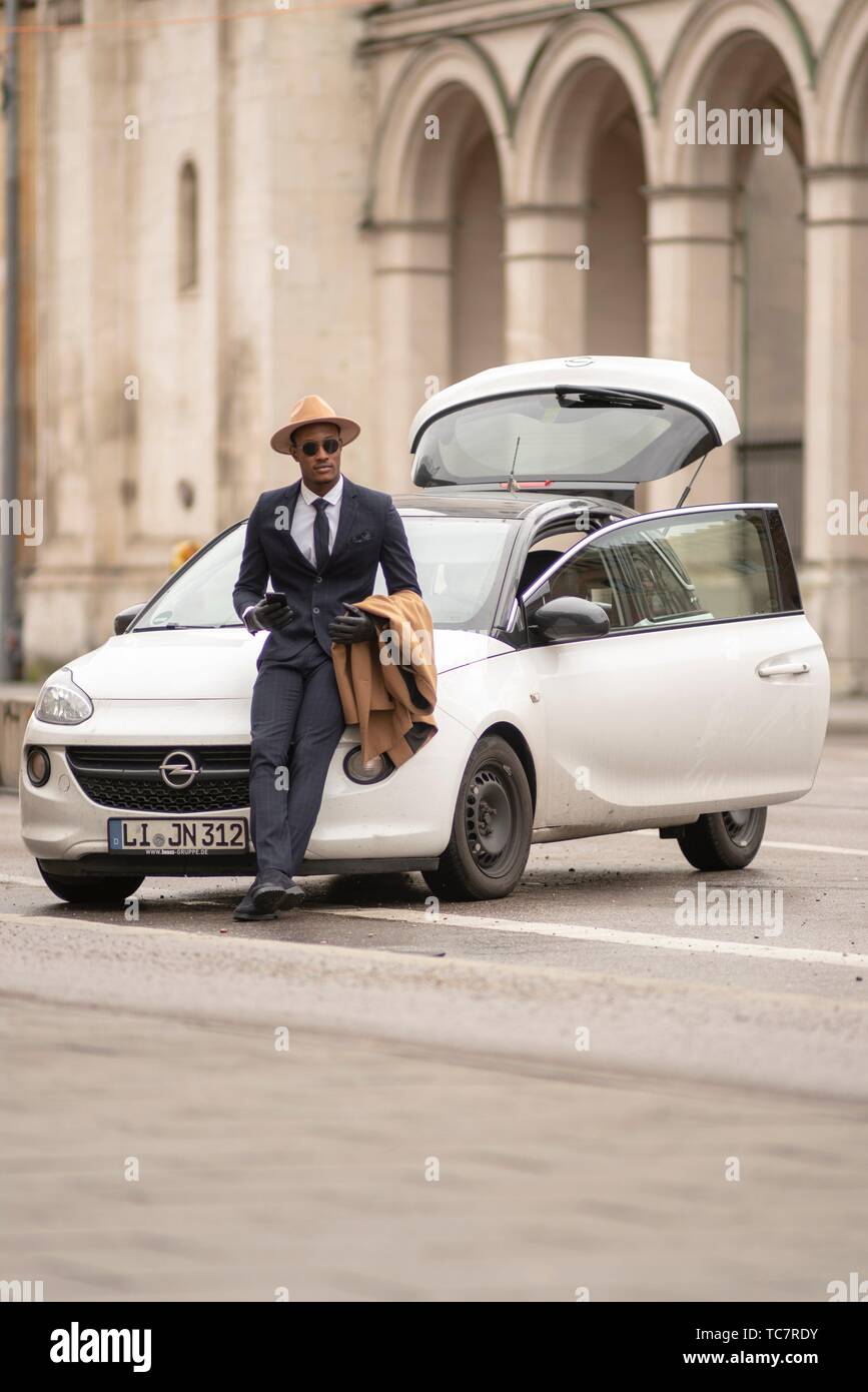 Man Leaning Against Car High Resolution Stock Photography and Images ...