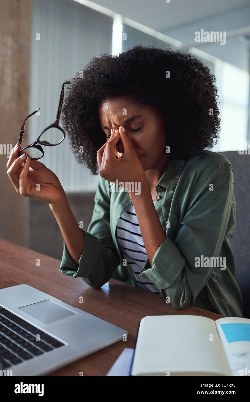 Tired frustrated businesswoman at workplace Stock Photo - Alamy