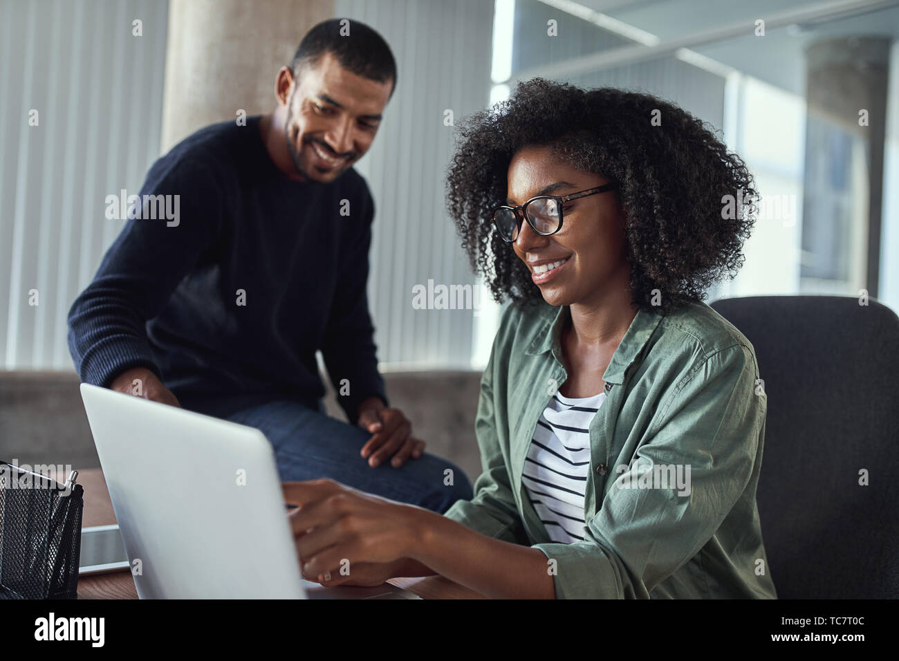 Creative colleagues working together in the office Stock Photo - Alamy