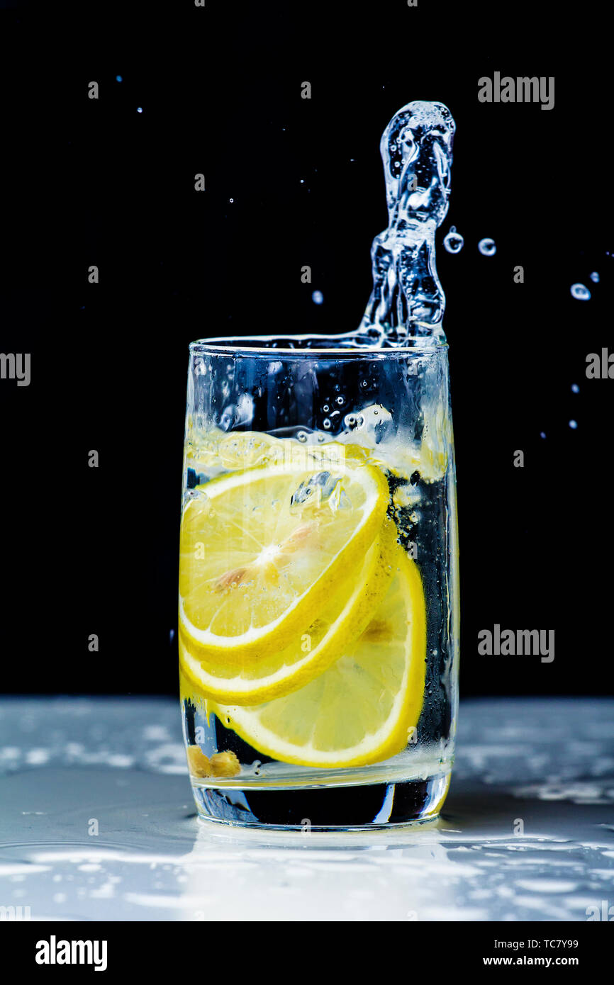 Splash clear lemonade Stock Photo - Alamy