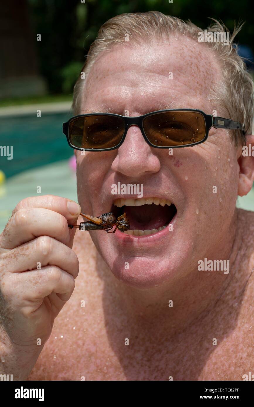 Man Eating Insect High Resolution Stock Photography and Images - Alamy