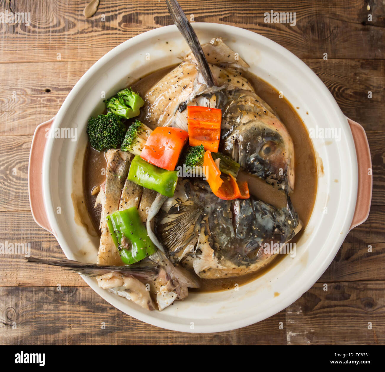 Stewed fish head Stock Photo - Alamy