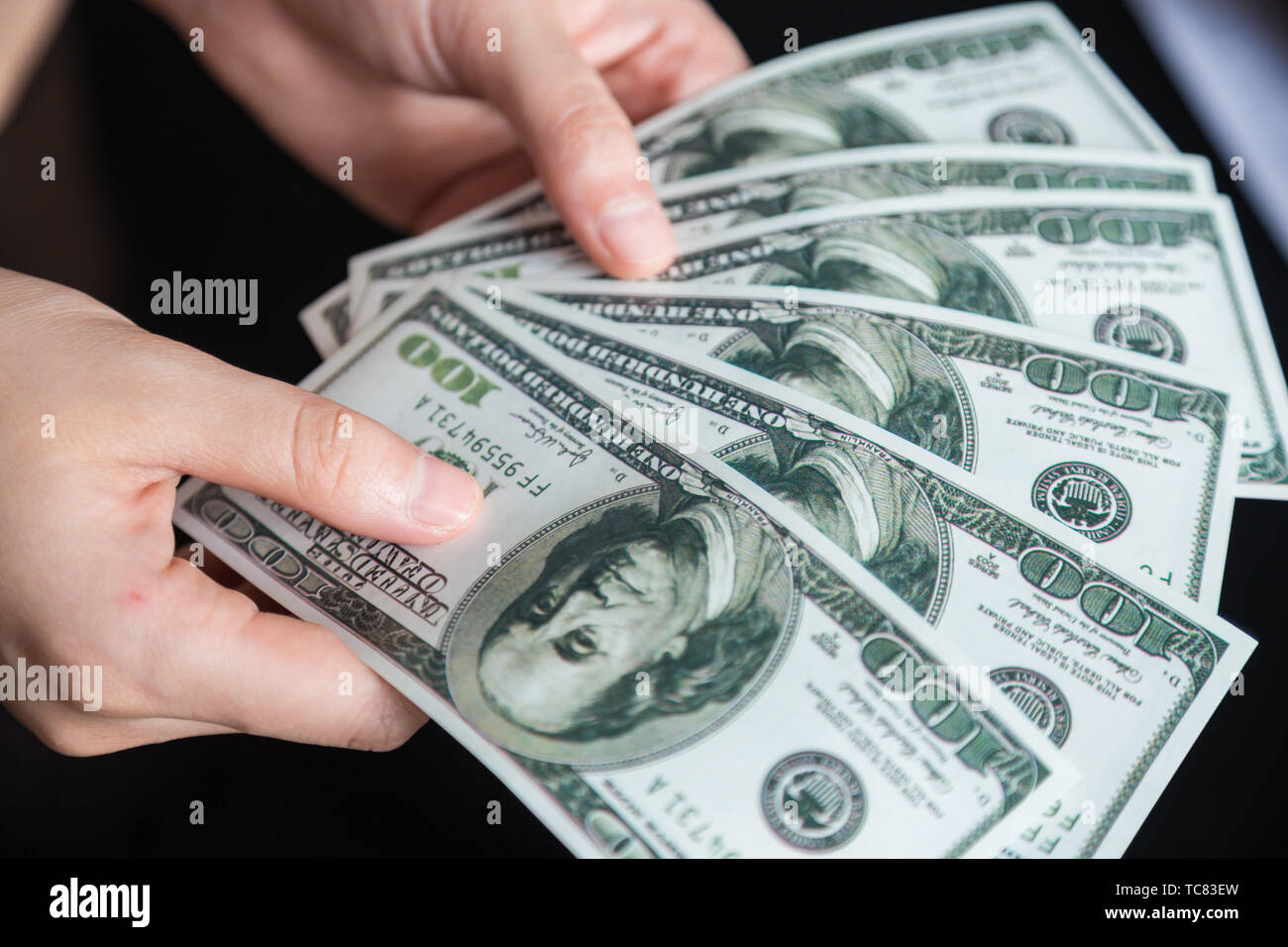 Counting money scene, financial business Stock Photo - Alamy