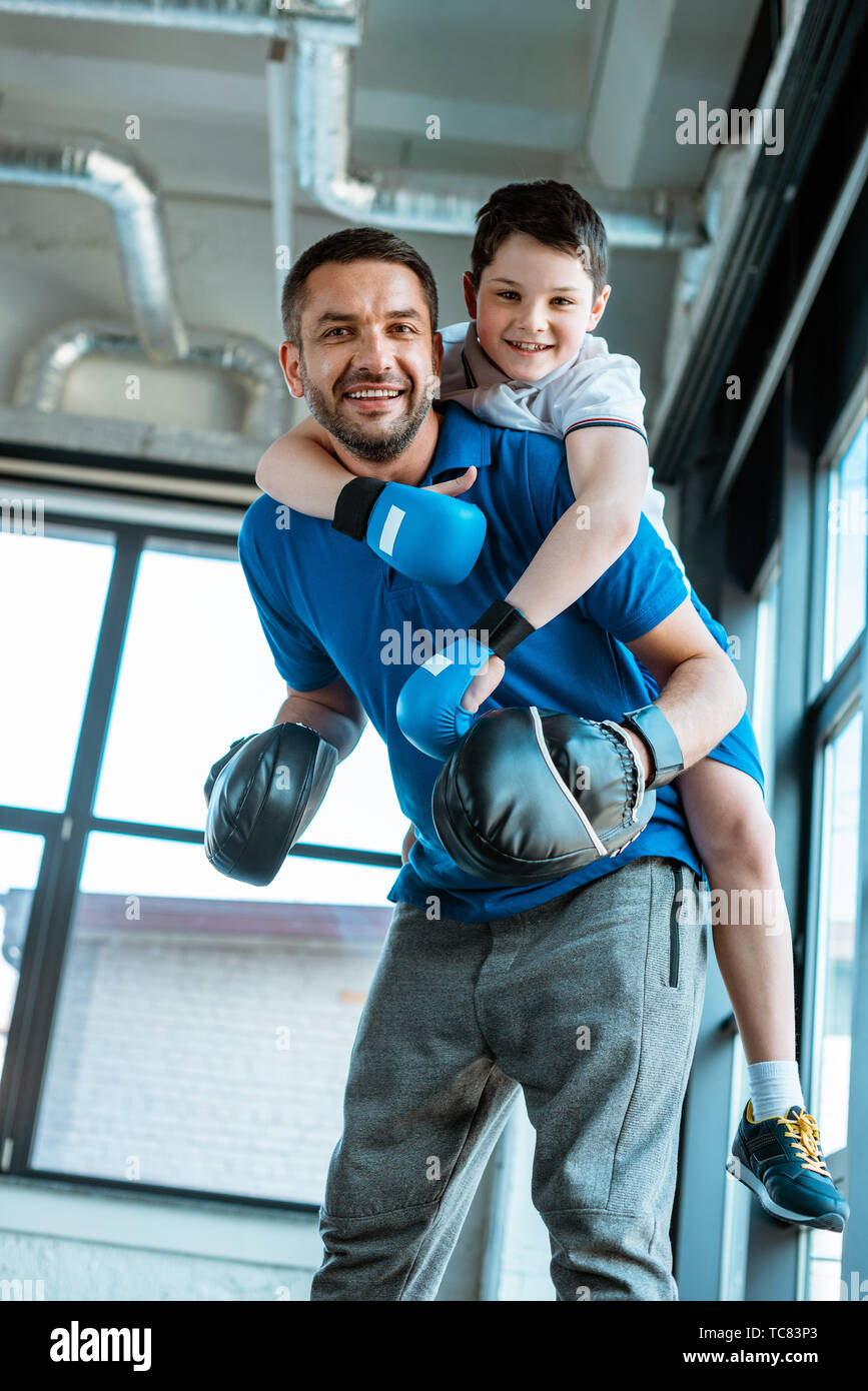 Father giving piggyback ride son hi-res stock photography and images ...