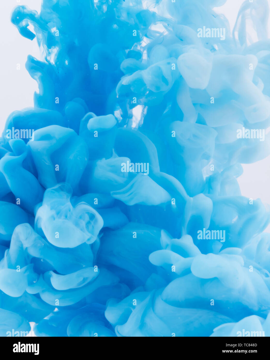 Blue propylene pigment in water, abstract background Stock Photo - Alamy