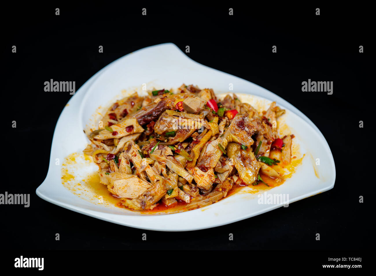drooling chicken, stick chicken Stock Photo - Alamy