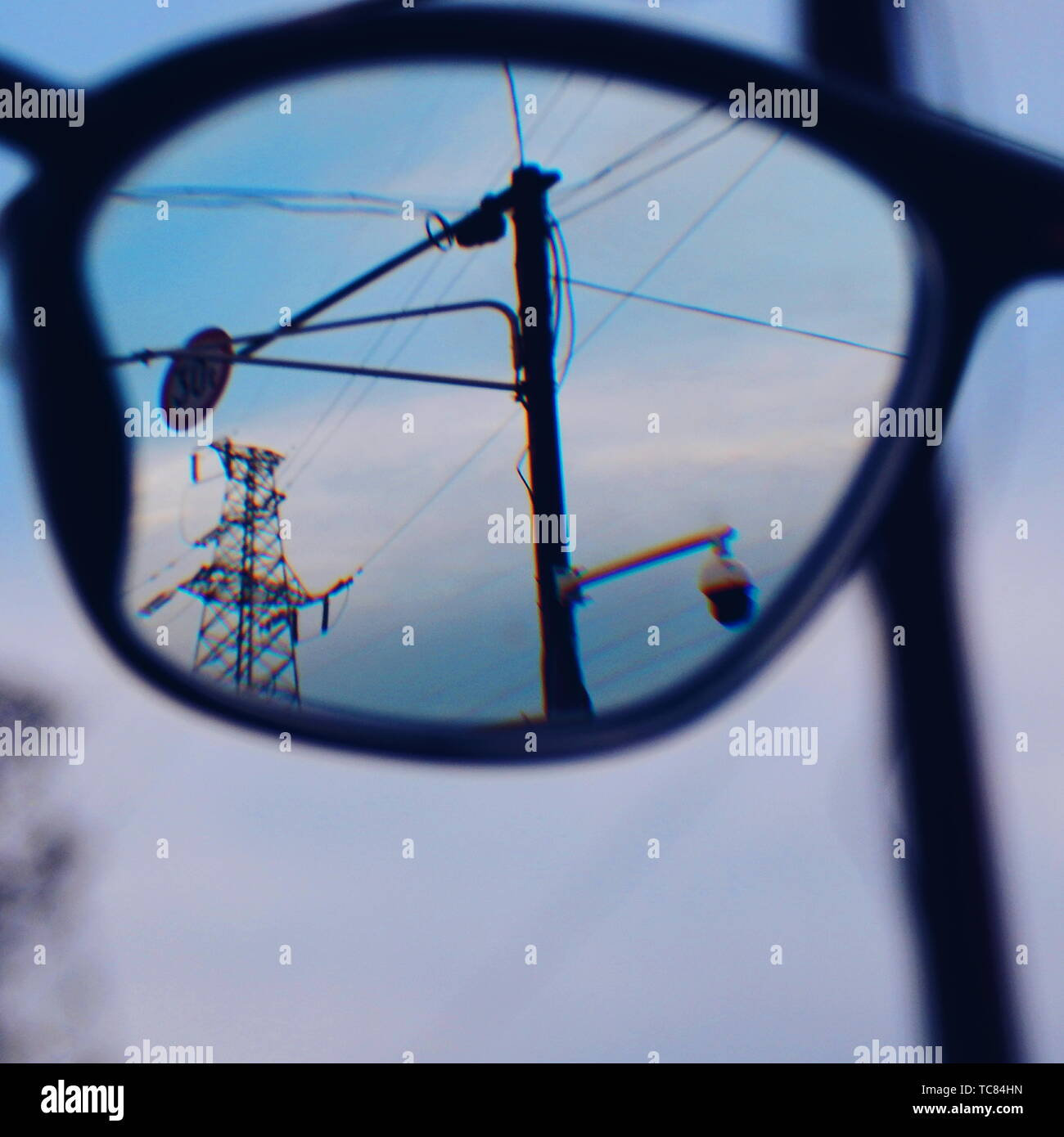 Look at the world through glasses Stock Photo - Alamy