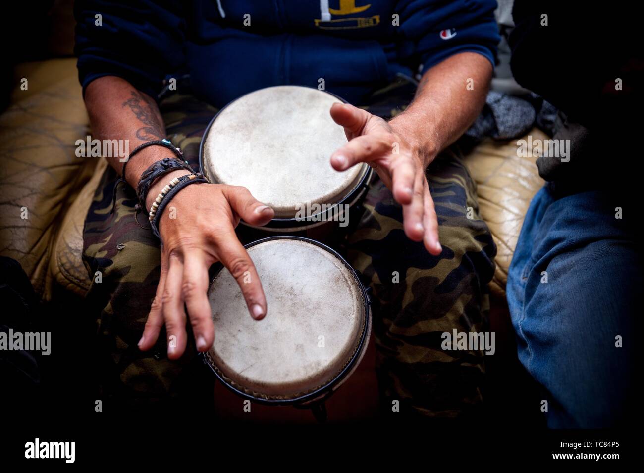 Man playing bongos hi-res stock photography and images - Alamy