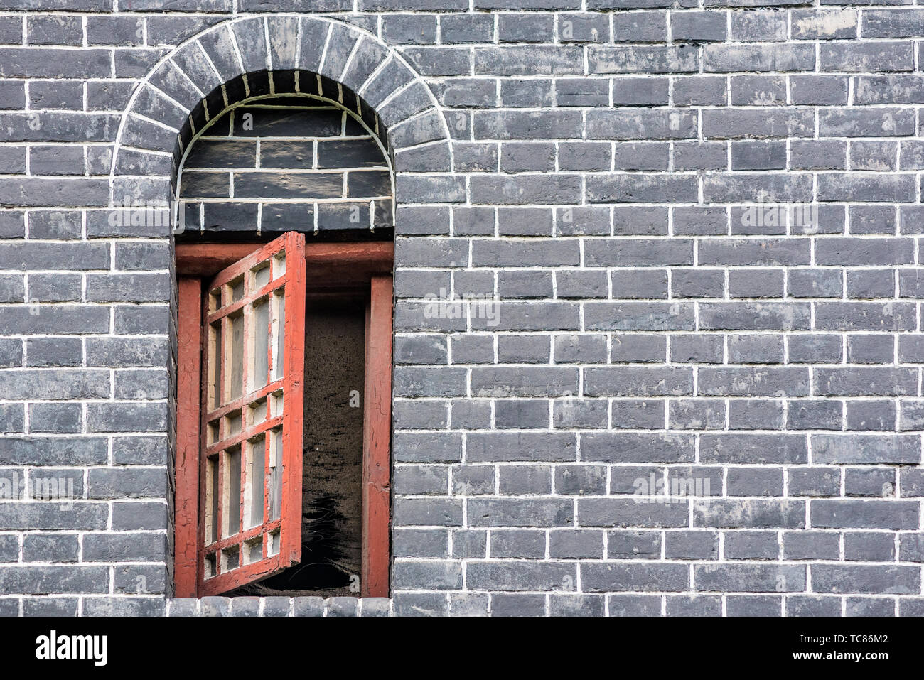 Small red window in a brick wall,Chengdu,China Stock Photo - Alamy